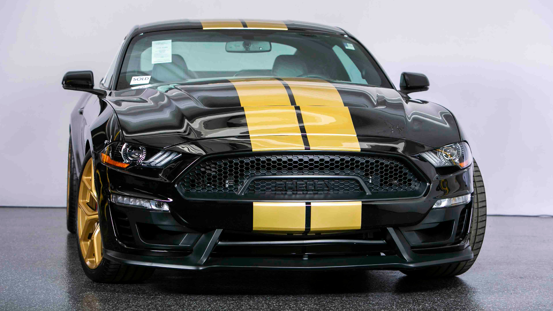 Black Mustang Gold Rims